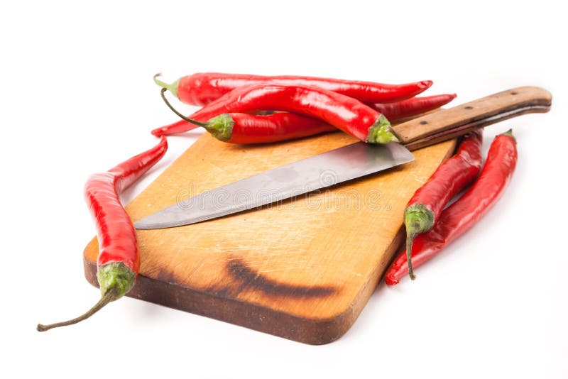 Hot Capsicum Chili Pepper and Knife on Board Stock Photo - Image of ...