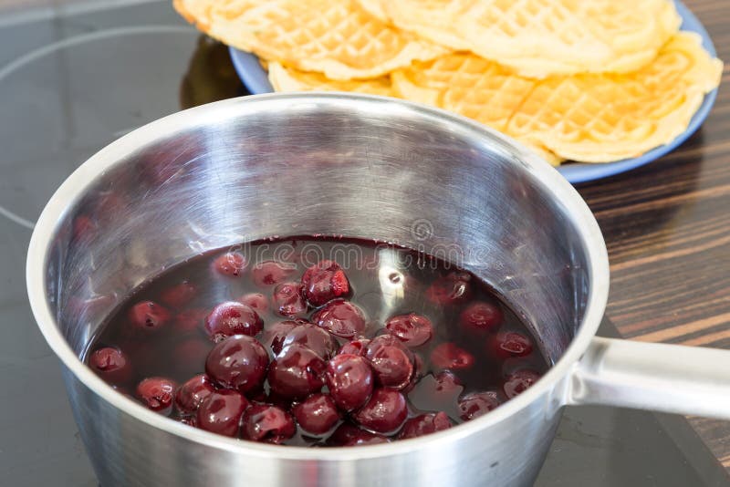 Hot Cherries in the pot stock photo. Image of dessert - 34800672