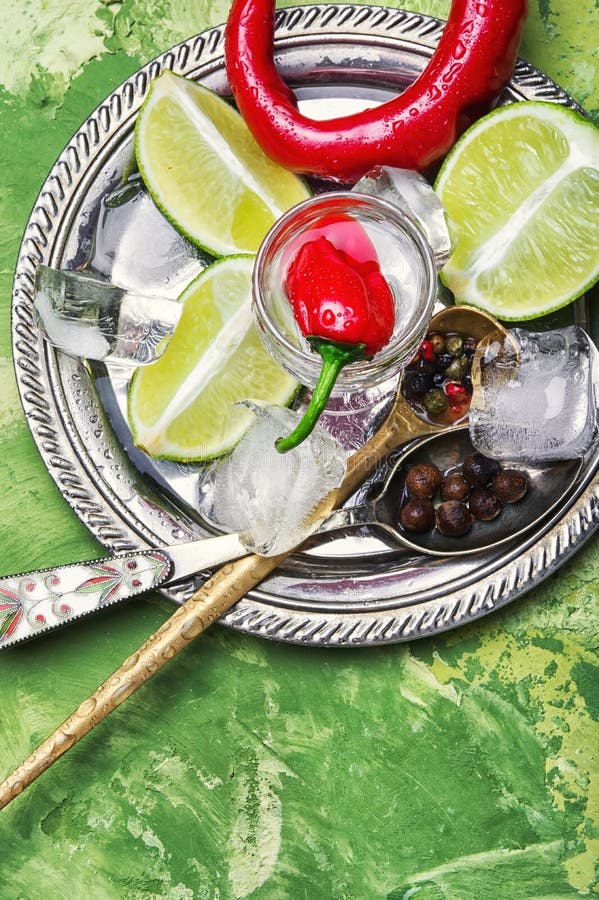 Hot Chilli Pepper with a Glass of Vodka Stock Photo - Image of pepper ...