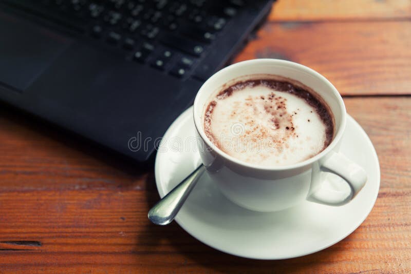 Hot Chocolate is Served with Hot Bread between the Notebook. Stock ...