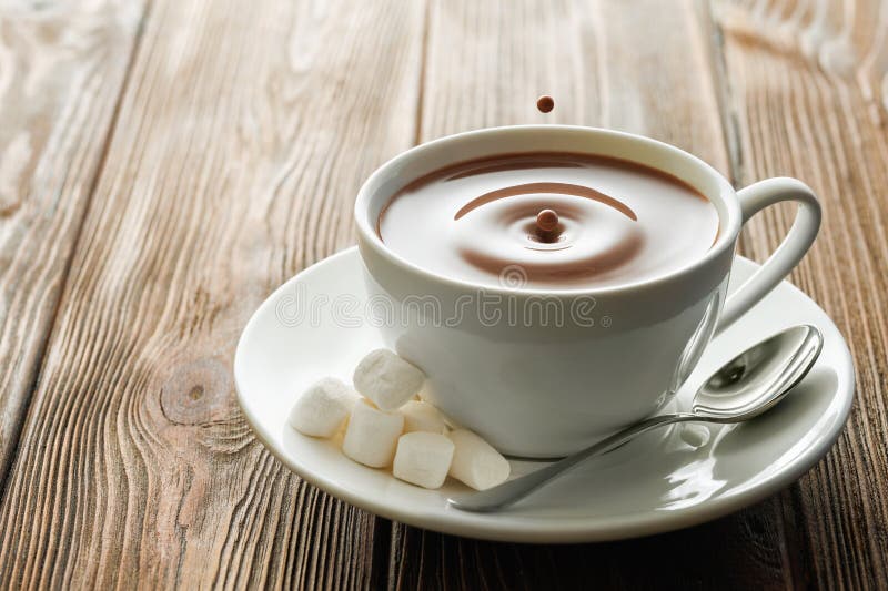 Hot Chocolate with Splash in White Cup on Wooden Table Stock Image ...