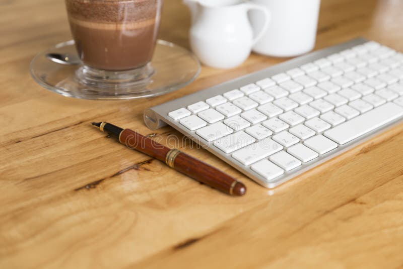 Hot Cocoa Chocolate Drink with Computer Keyboard and Pen Stock Image ...