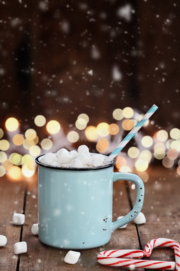 Hot Cocoa With Mini Marshmallows With Falling Snow Stock Image - Image ...