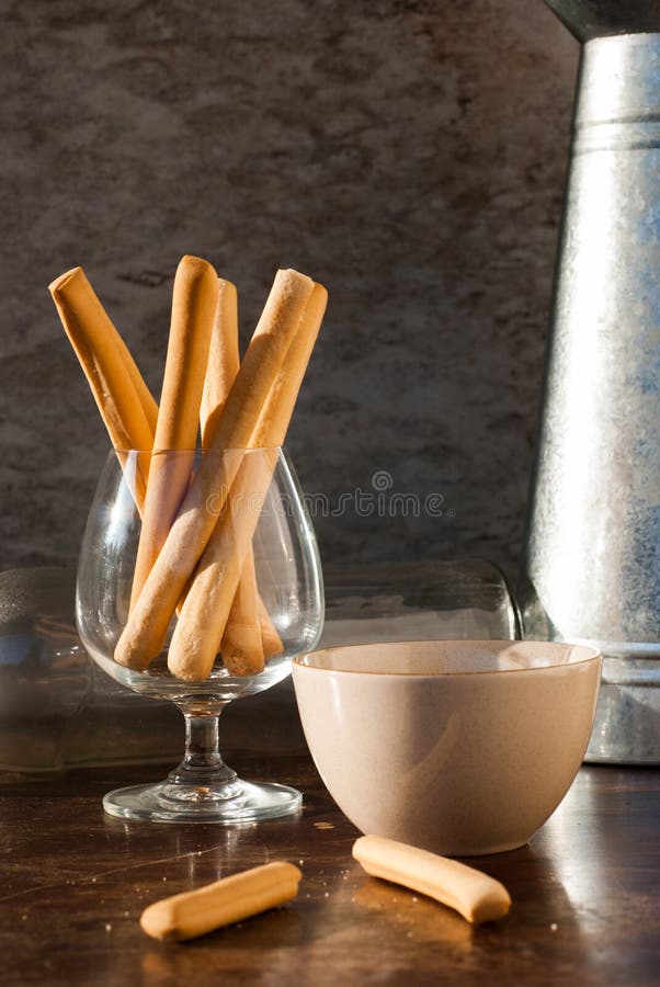 Hot Coffee and Bread Sticks on the Wooden Table Stock Photo - Image of ...