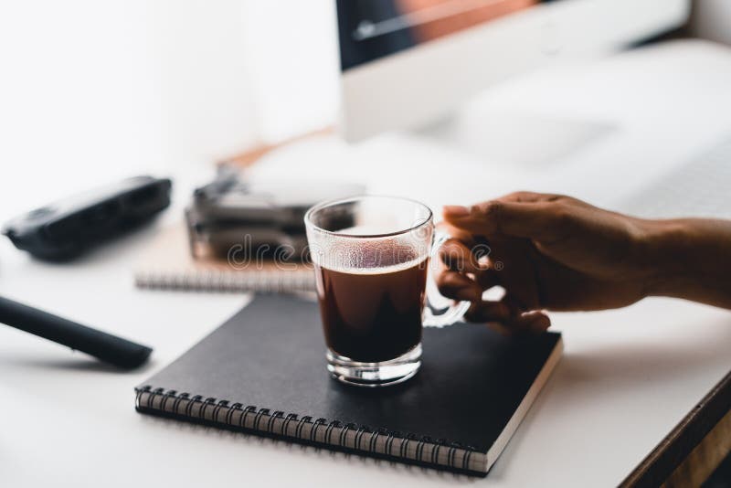 Hot Coffee In A Cup At The Computer Desk Stock Image - Image of office ...
