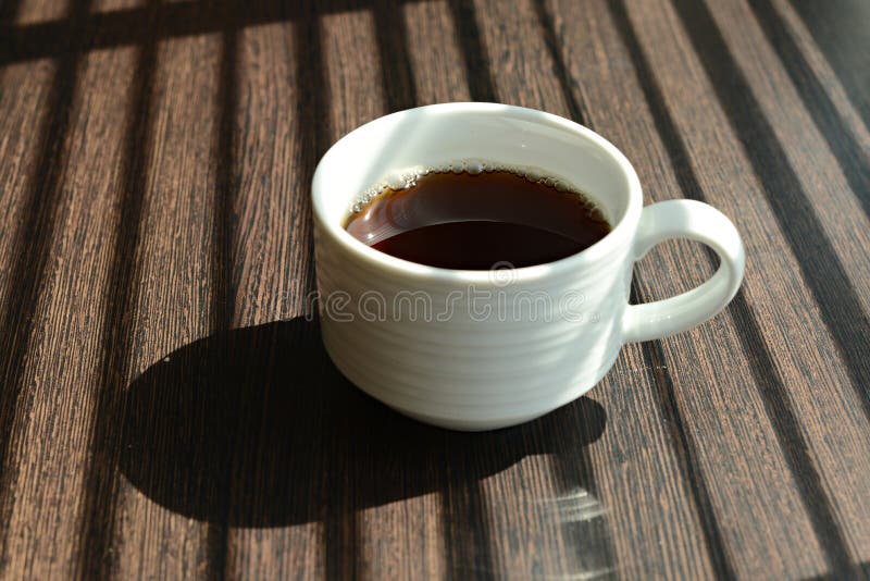 Hot Coffee Cup on Table Near Windows Stock Image - Image of natural ...