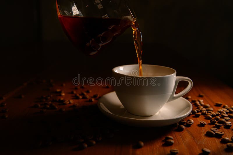 Hot Coffee from Fresh Coffee Beans Ready To Drink in a White Coffee Cup ...