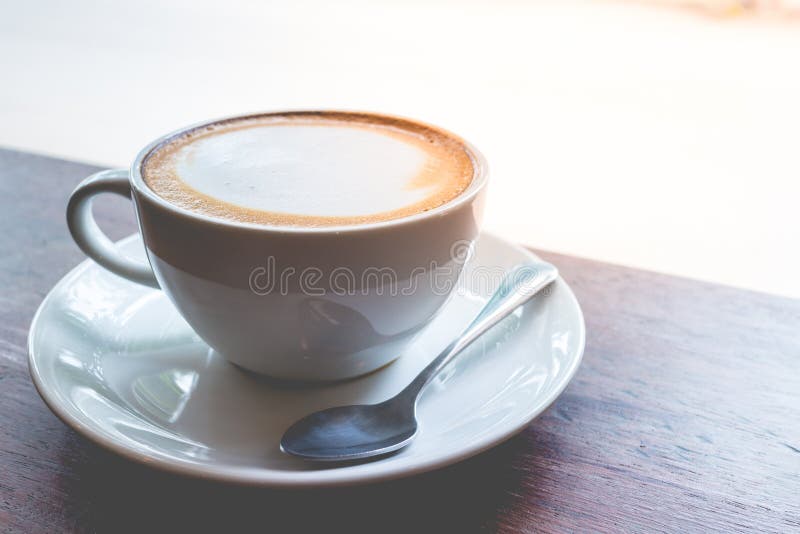 Hot Coffee Mocha with Foam Milk in Vintage Cafe Stock Photo - Image of ...