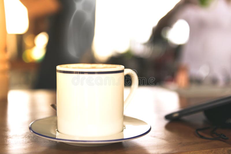 Hot coffee on the table stock image. Image of table - 107899145