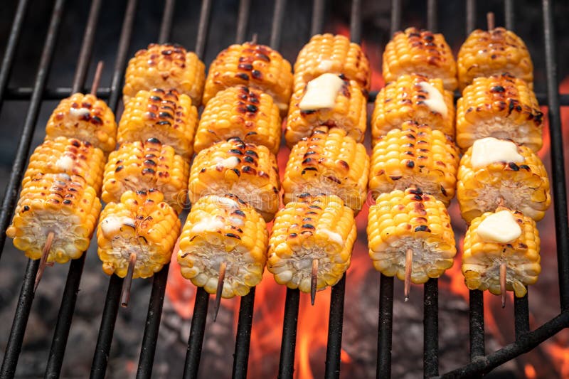 Hot Corncob with Butter on Grill on Bonfire with Flames Stock Photo ...