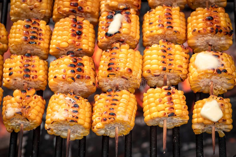 Hot Corncob on Grill with Melting Butter and Salt Stock Photo - Image ...