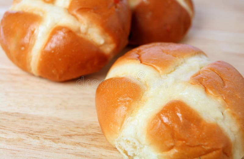 Hot cross buns on a board stock photo. Image of sweet - 4599686