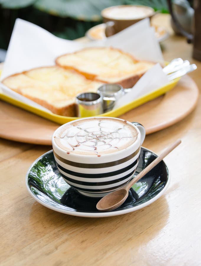 Hot Cup of Coffee with Spoon and Toast Stock Photo - Image of caffeine ...