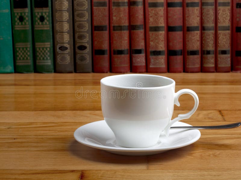 Hot Cup of Fresh Coffee on Wooden Table and Stack of Books Stock Image ...