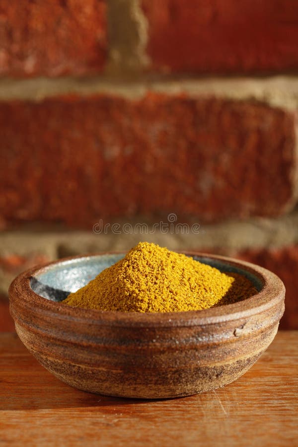 Hot Curry Powder Spice in Bowl on Wooden Table Stock Photo - Image of ...