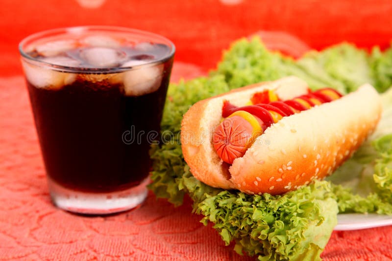 Hot dog and drink stock photo. Image of nourishment, cooked - 20665504