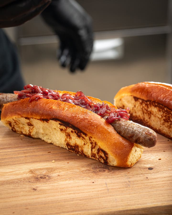 Hot Dog in a Process of Preparation in Kitchen Stock Photo - Image of ...