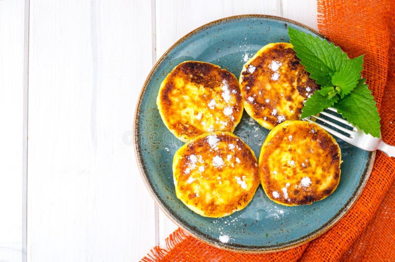 Hot Fried Delicious Cheese Cakes with Powdered Sugar Stock Photo ...