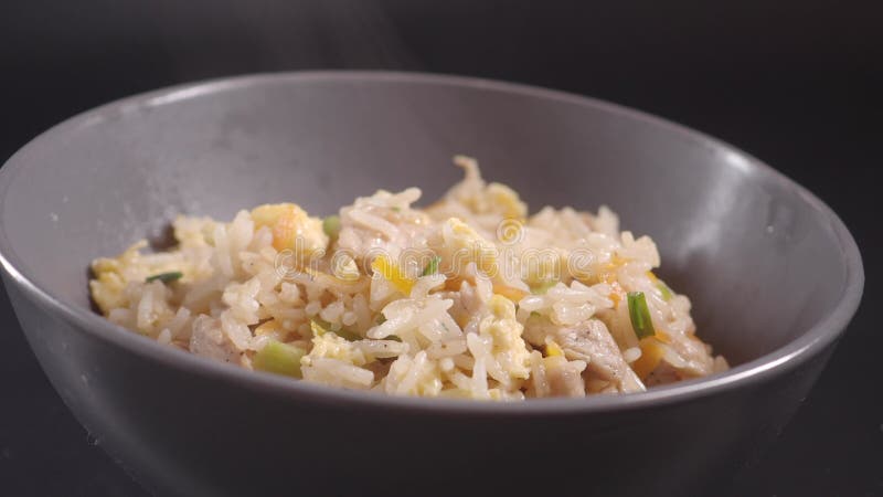 Hot Fried Rice in a Bowl on Table Stock Footage - Video of parsley ...