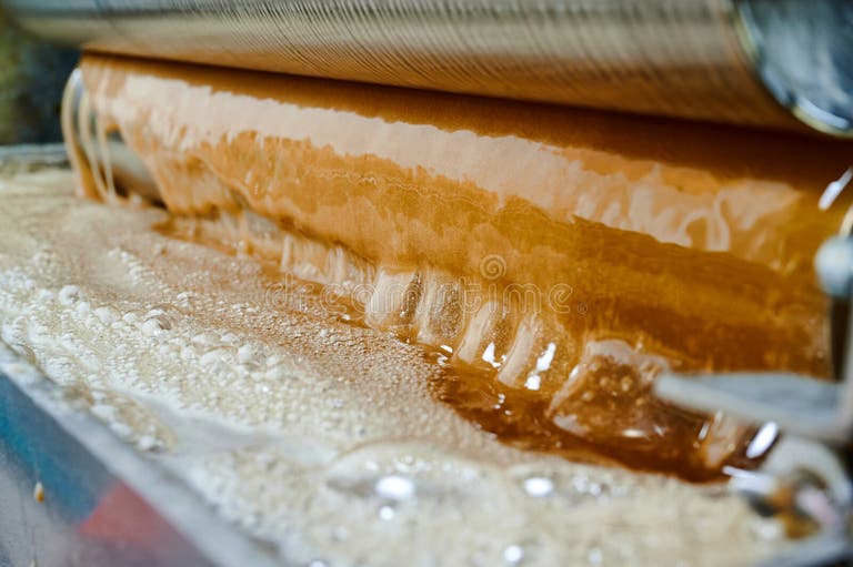 Hot Glue Application Process in a Specialized Machine with a Bubbling ...