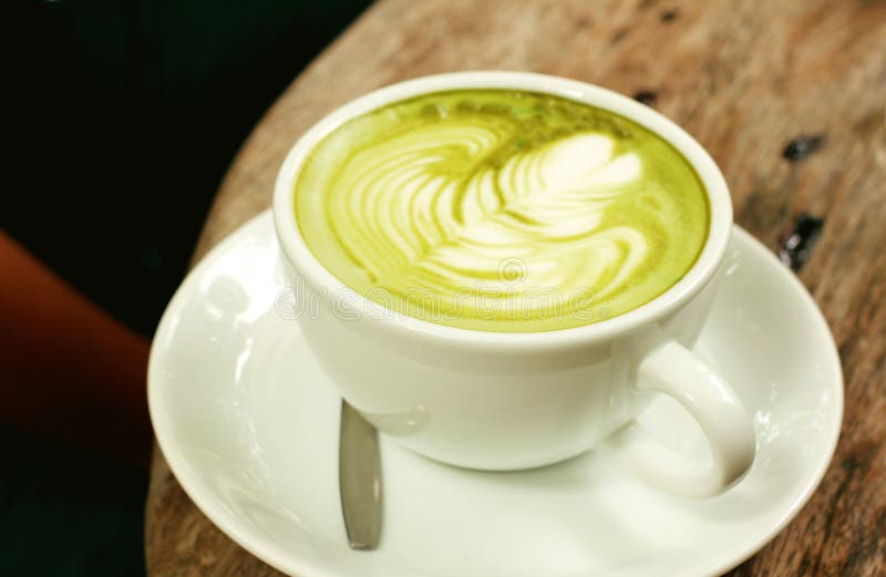 Hot green tea and milk stock image. Image of creamy, freshness - 57832537