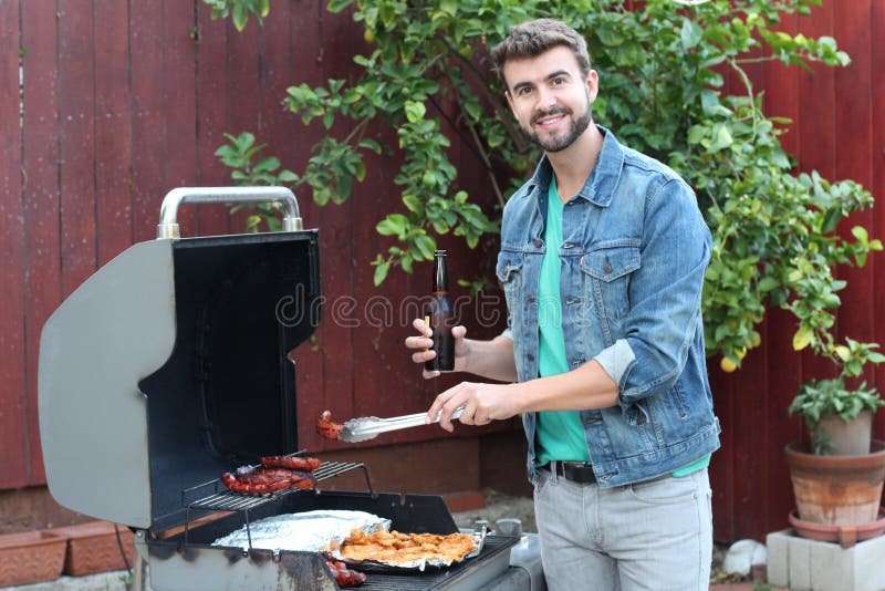 Hot Guy Preparing Dinner in Barbecue Stock Photo - Image of meat ...