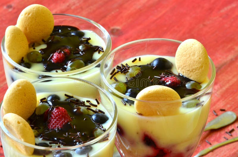 Hot Homemade Vanilla Pudding with Strawberries and Vine Berries Stock ...