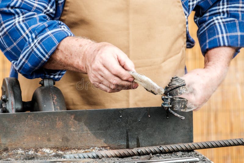 Hot iron working handwork stock photo. Image of worker - 79479336