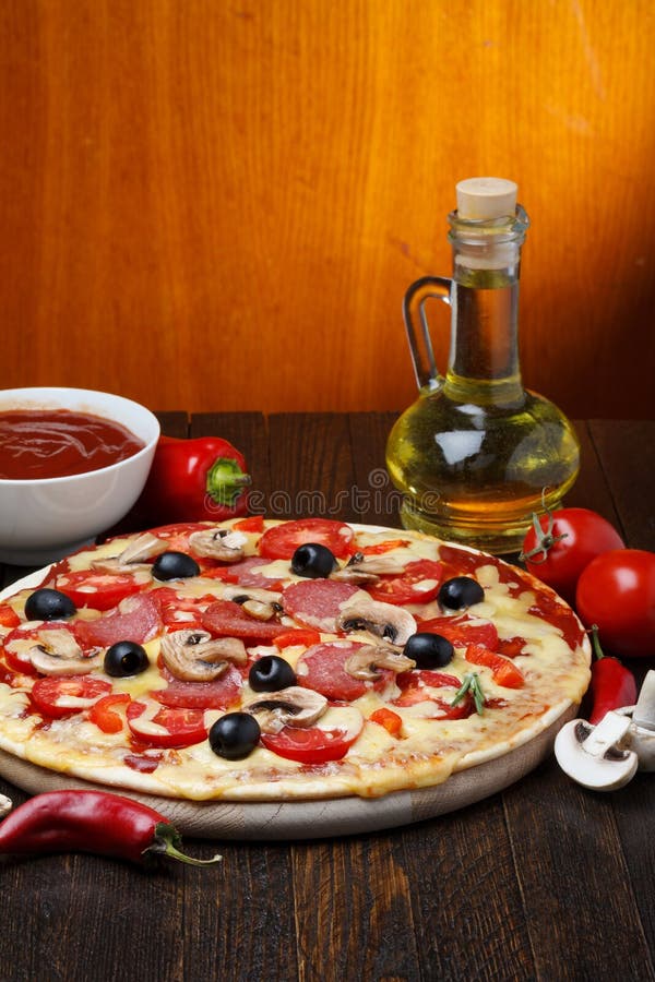 Hot italian pizza stock image. Image of rosemary, sauce - 27025893