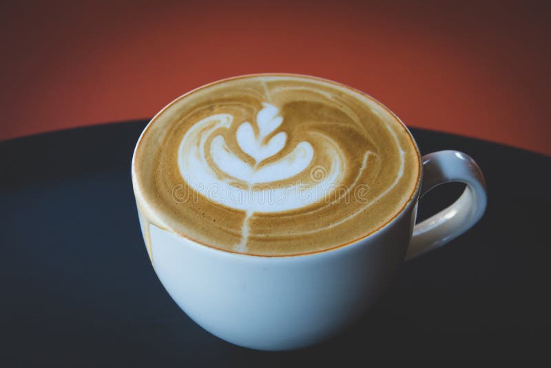 Hot latte coffee in cafe stock image. Image of latte - 88509441