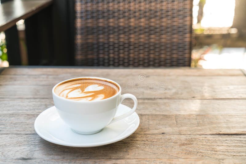 Hot latte coffee stock photo. Image of wood, view, sunshine - 96190056