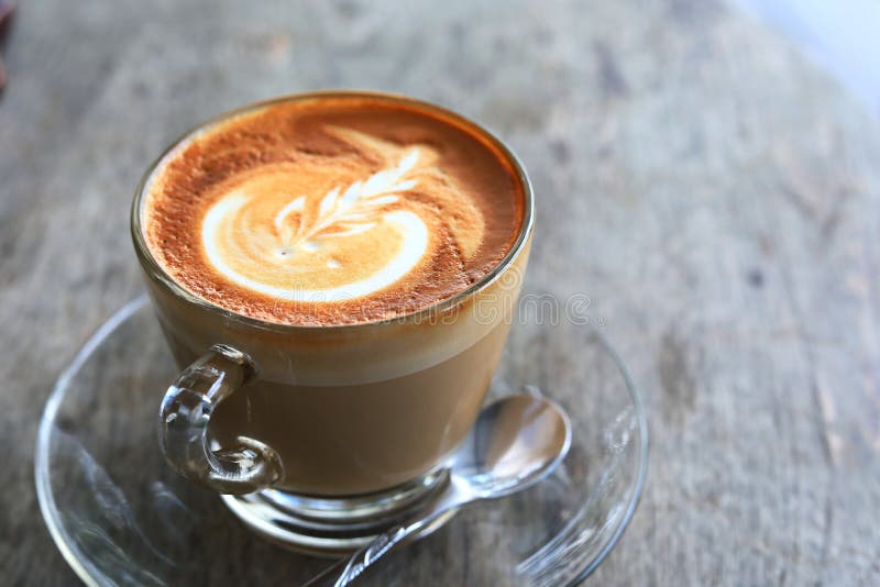Hot latte coffee in cafe stock image. Image of glass - 170164223