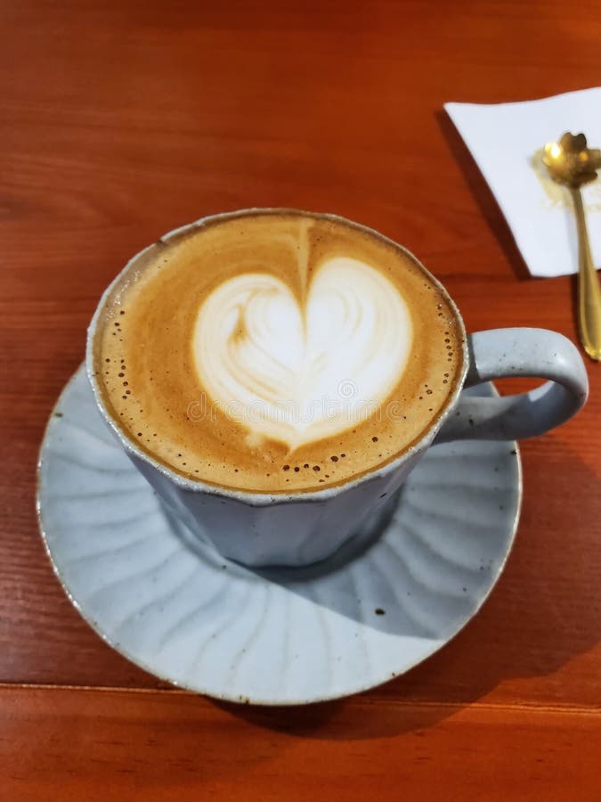 A Hot Latte with a Heart Pattern Stock Photo - Image of quail ...