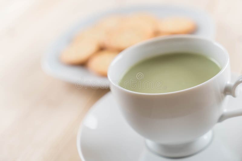 Hot matcha latte stock image. Image of drink, wooden - 98175217