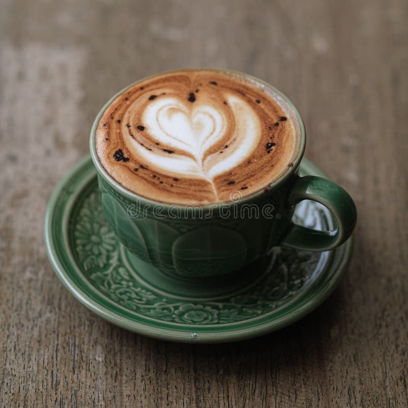 Hot mocha on the table stock photo. Image of green, cappuccino - 336138148