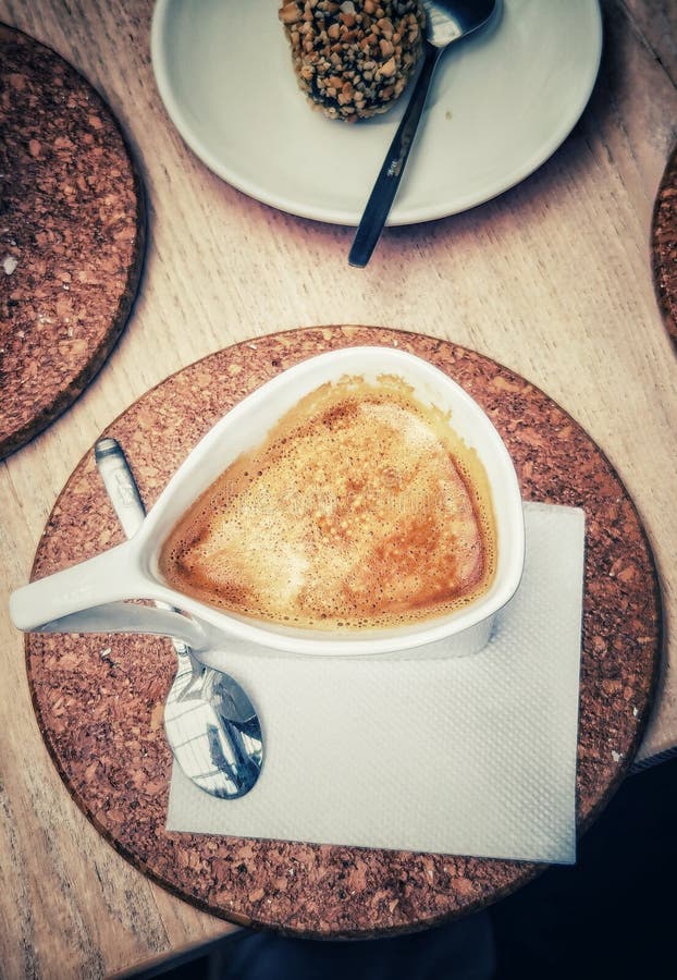 Hot Coffee in a White Ceramic Cup of Triangular Shape, Top View Stock ...