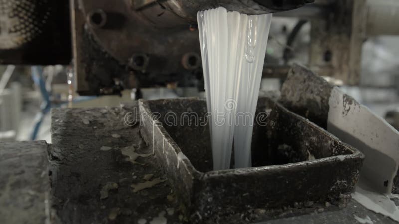 Hot Plastic Flows Pouring into Metal Container in Workshop Stock Video ...