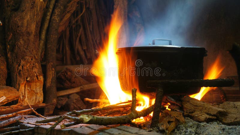 Hot pot on fire stock photo. Image of boiling, dark, boiler - 73442054