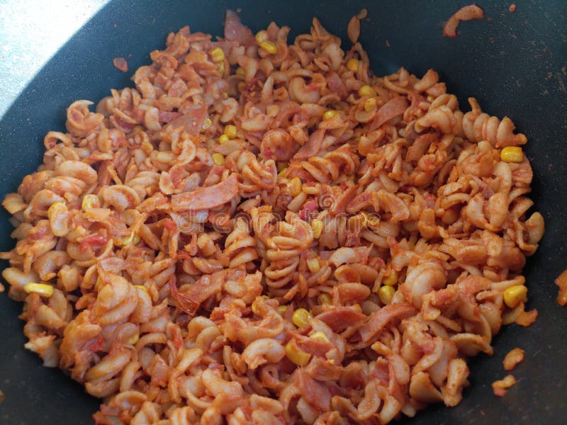 Close Up of Tomato Pasta Cooking in a Pan Stock Image - Image of close ...