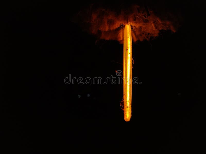 Burning bulb inside a box stock image. Image of science - 164022823