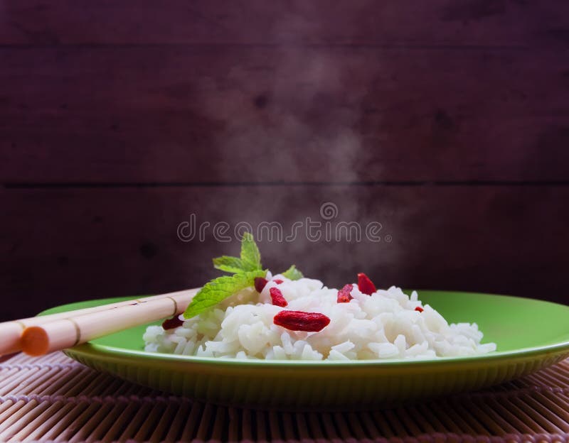 Hot rice with goji stock image. Image of chopsticks, goji - 32892921