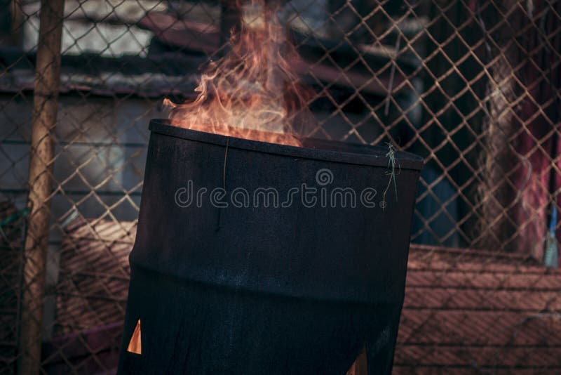 A Hot Fire in an Old Rusty Iron Barrel Stock Photo - Image of abandoned ...
