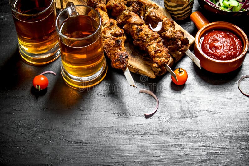 Hot Shish Kebab with a Cold Beer. Stock Photo - Image of blackboard ...