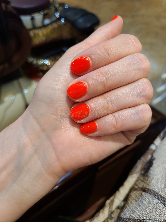 Hot Short fire red nails stock image. Image of short - 188590693
