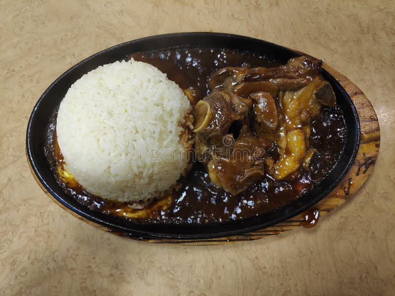 Hot Sizzling Black Paper Lamb with Rice. Stock Photo - Image of asian ...