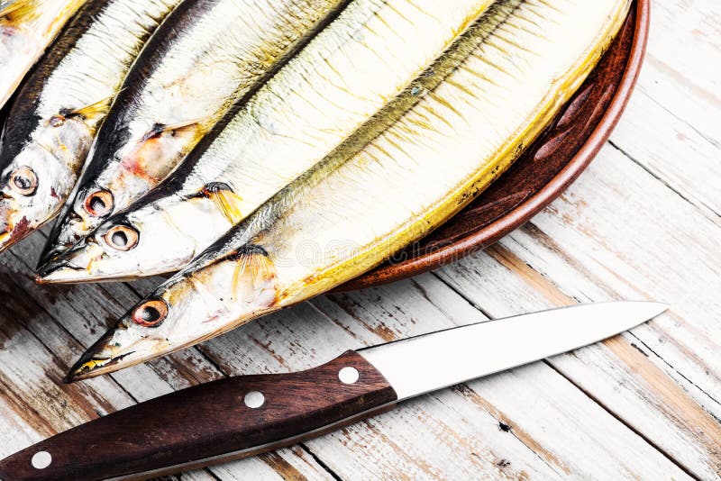 Hot smoked fish on plate stock photo. Image of kitchen - 145557858