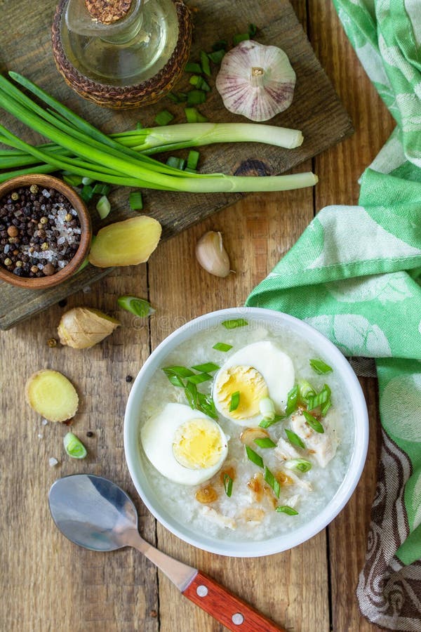 Arroz Caldo Soup. Hot Soup with Ginger Chicken Rice and Garlic. Stock ...