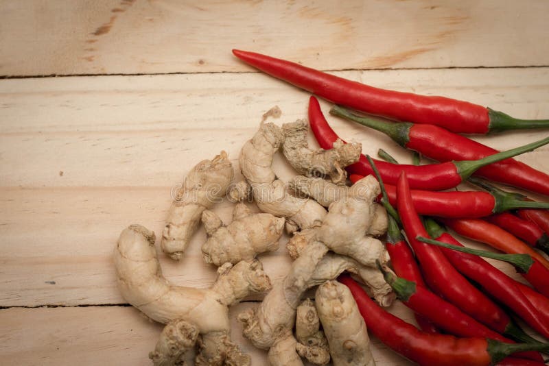 Hot and Spicy Red Chilli on Wood Table Background Stock Photo - Image ...