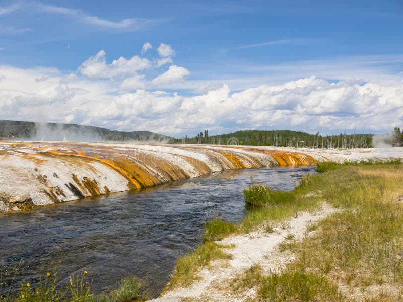 Hot Spring Flowing into River Stock Photo - Image of wyoming, spring ...