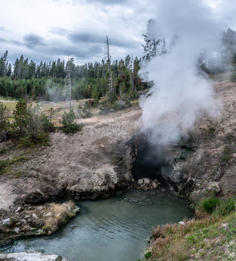 Hot Spring and Geiser in Yellowstone National Par Stock Photo - Image ...